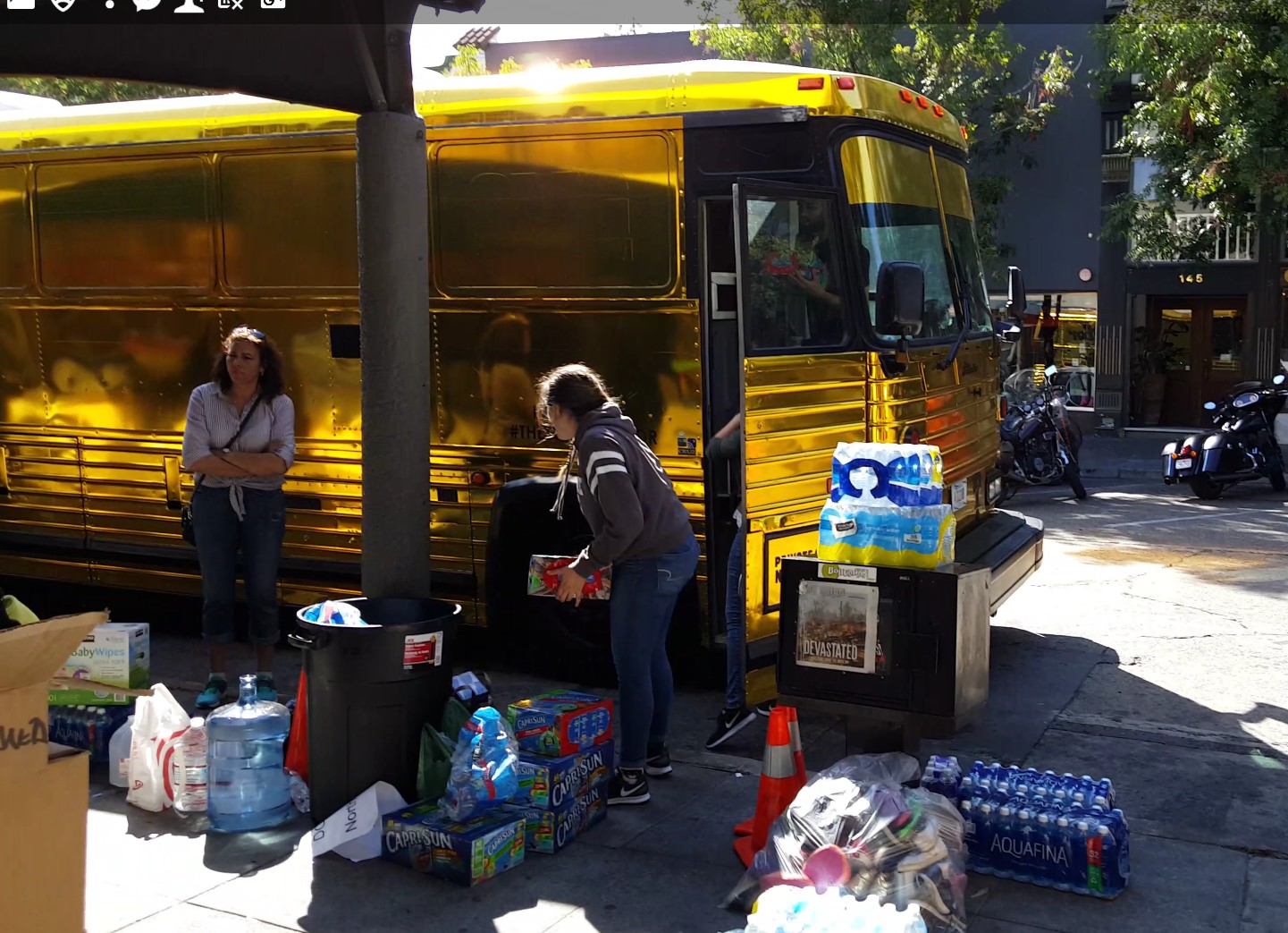 Gold Party Bus Delivers Donations to Fire Victims | KQED